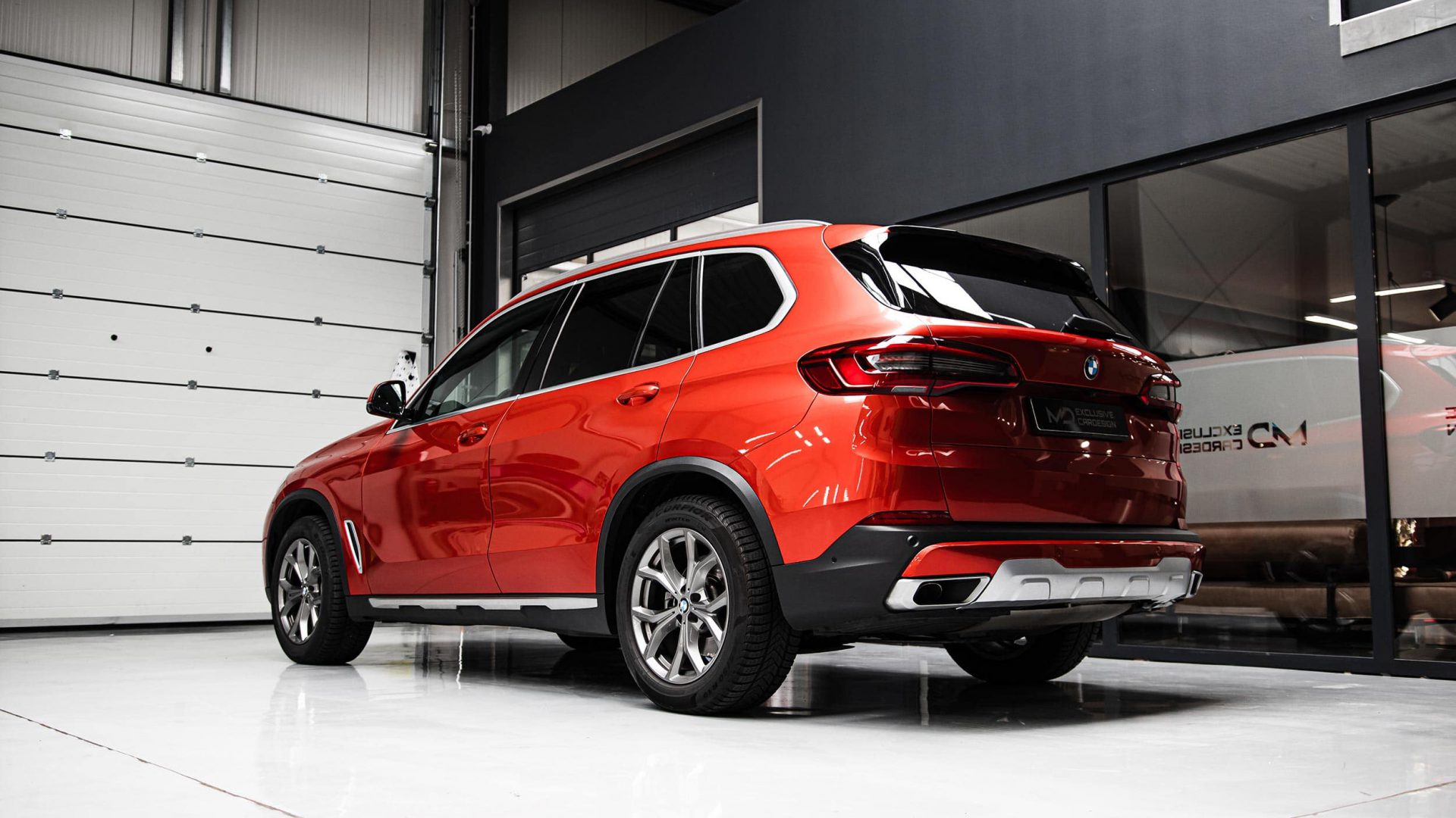 BMW X5 G05 - Folierung in PWF Ruby Red CC 4115 - M&D exclusive cardesign