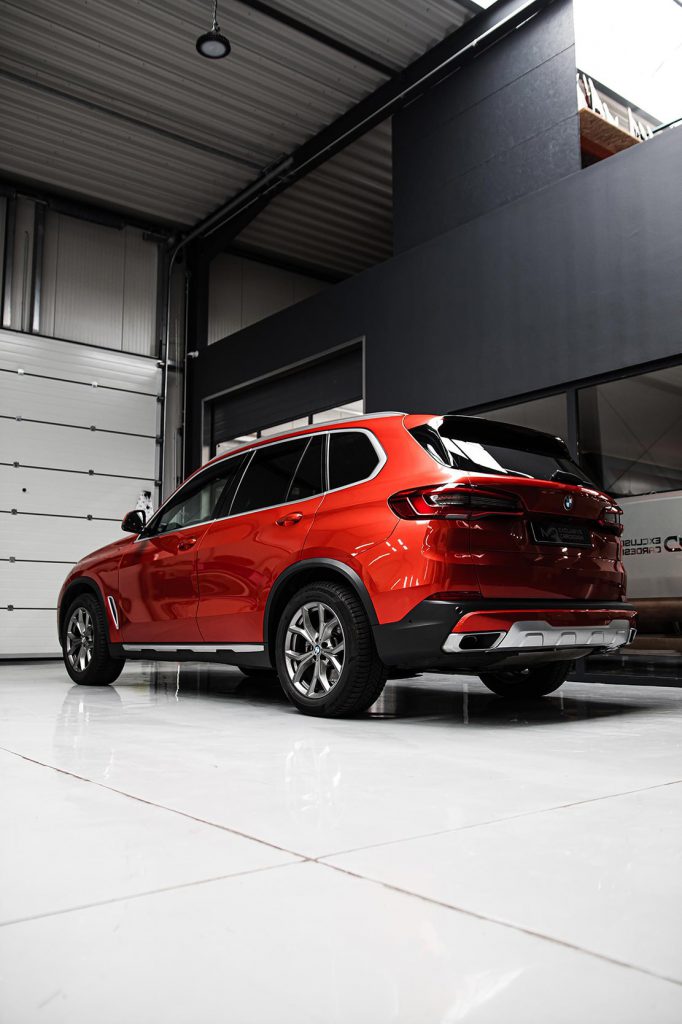 BMW X5 G05 - Folierung in PWF Ruby Red CC 4115 - M&D exclusive cardesign