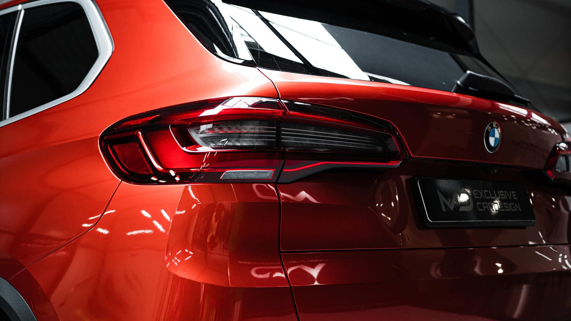 BMW X5 G05 - Folierung in PWF Ruby Red CC 4115 - M&D exclusive cardesign